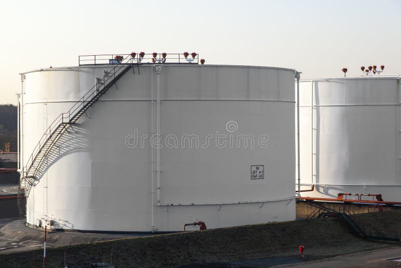 White tank in tank farm stock photo. Image of ladder - 25098304