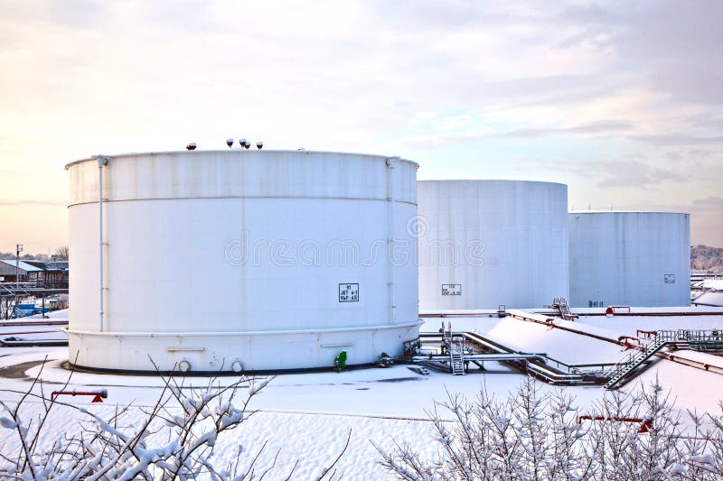 White Tanks in Tank Farm with Snow in Winter Stock Photo - Image of ...