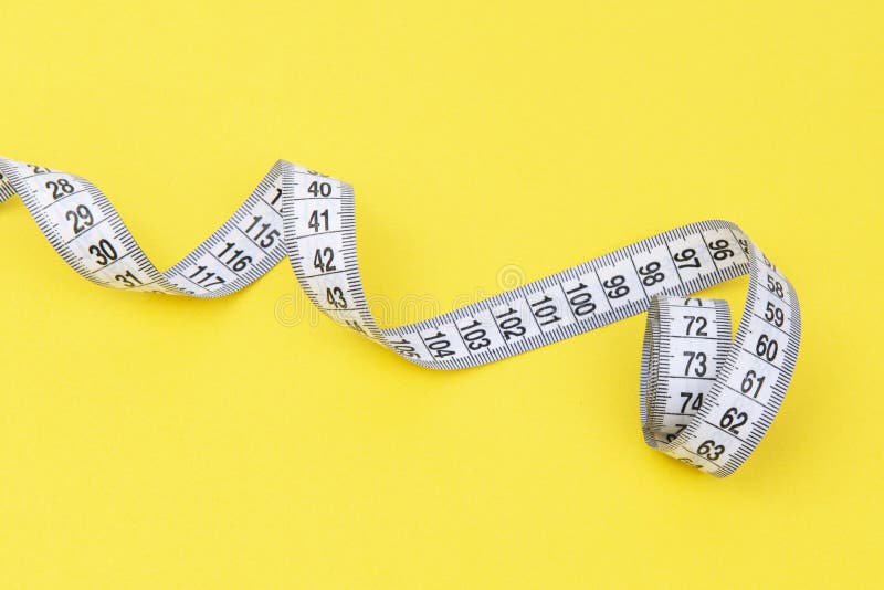 White Tape Measuring Isolated on a Yellow Background Stock Image ...
