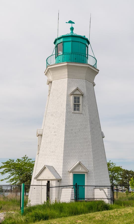 White and teal lighthouse stock image. Image of church - 232411373
