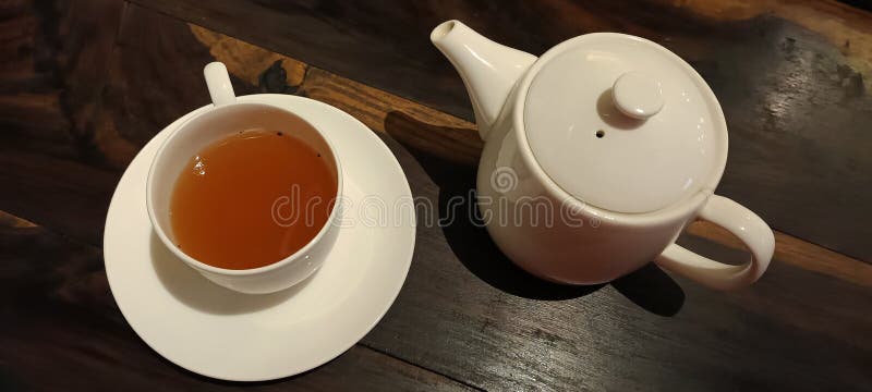 White Teapot and a Cup of Tea from Above Stock Photo - Image of teapot ...