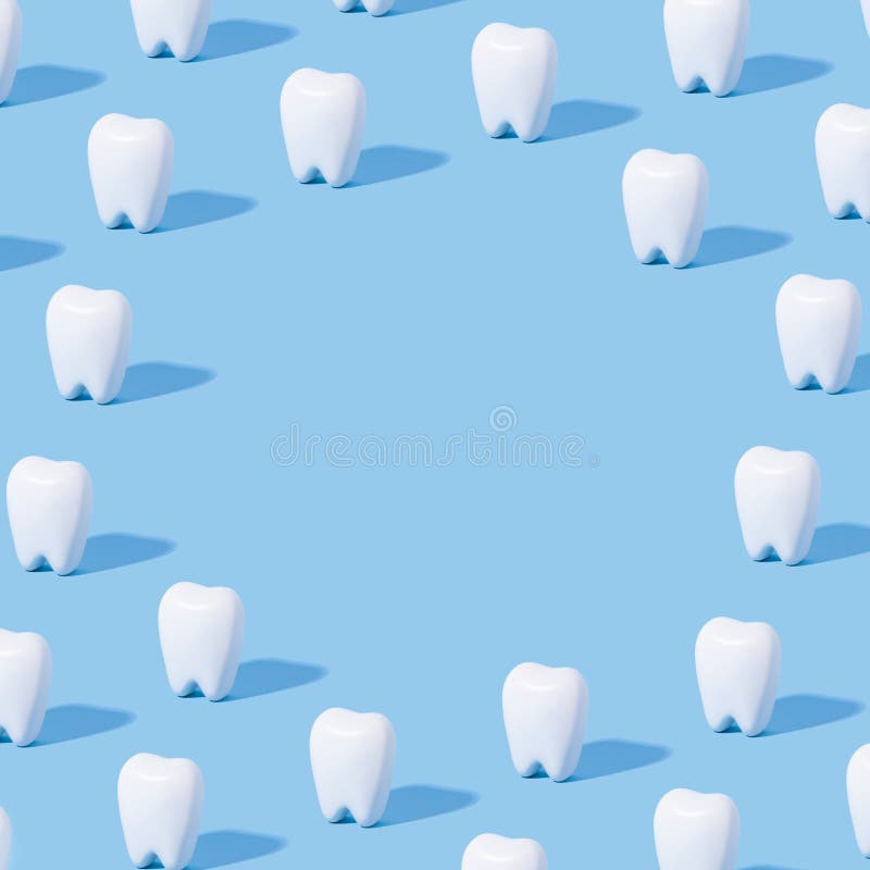 White Teeth Pattern on a Blue Paper Background with Text Place Stock ...