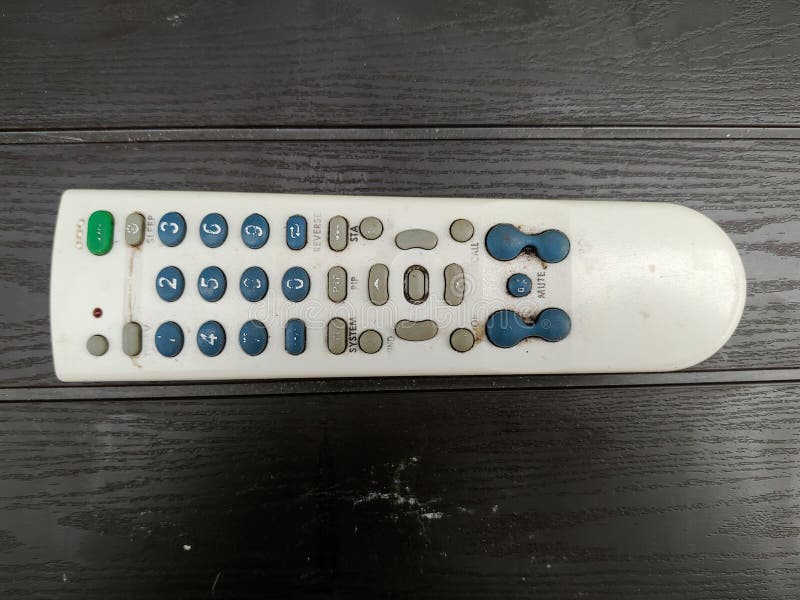 A White Television Remote with Lots of Buttons Stock Photo - Image of ...