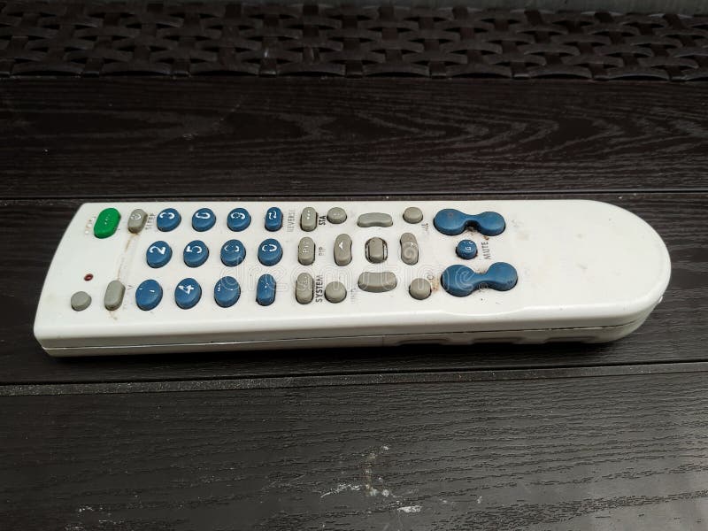 A White Television Remote with Lots of Buttons Stock Image - Image of ...
