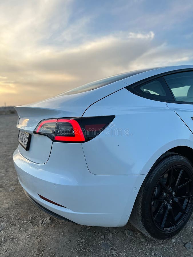 White Tesla Model 3 Parked Outdoors at Sunset Editorial Stock Image ...