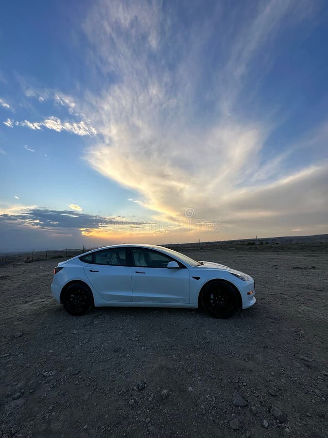 White Tesla Model 3 Parked Outdoors at Sunset Editorial Stock Image ...