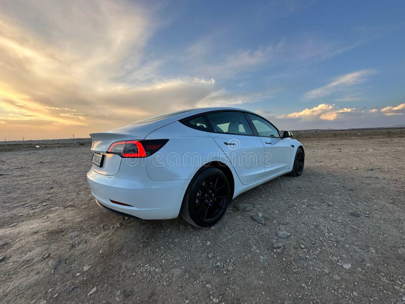 White Tesla Model 3 Parked Outdoors at Sunset Editorial Photo - Image ...