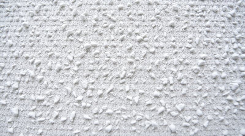 White Textured Surface with Small Raised Bumps Creating a Subtle ...