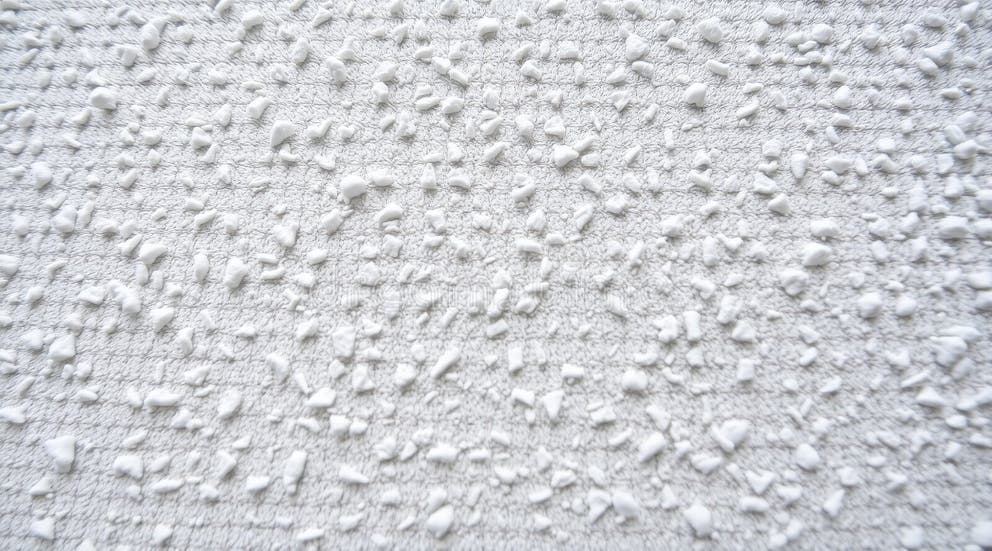 White Textured Surface with Small Raised Bumps Creating a Subtle ...