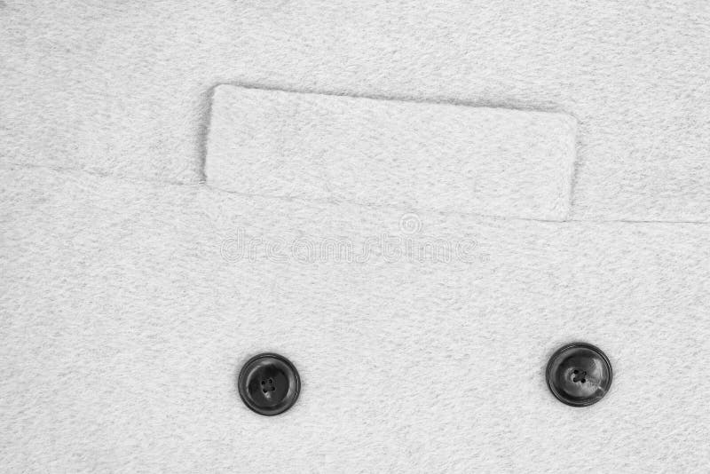 White Textured Woolen Coat Fabric with a Lapel Pocket and Two Buttons ...