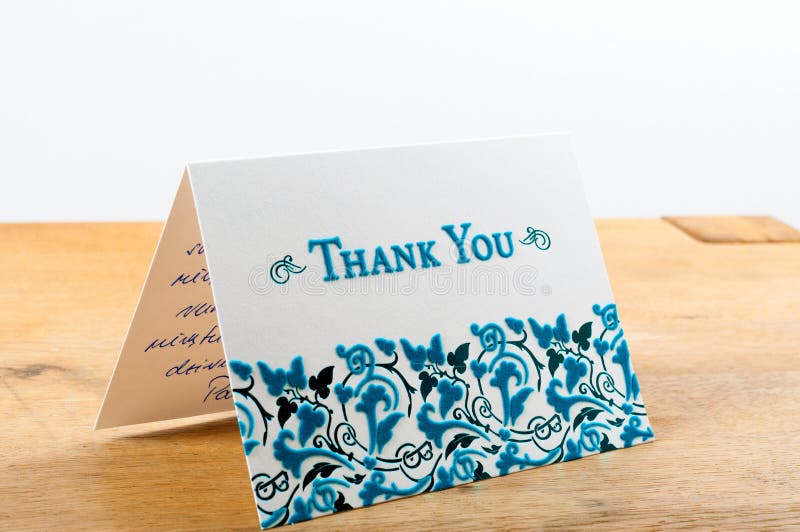 White Thank You Card with Blue Letters with Note Written by Hand Stock ...
