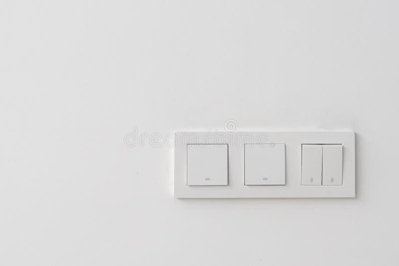 White Three Light Switch Panel on Hotel Wall Stock Image - Image of ...