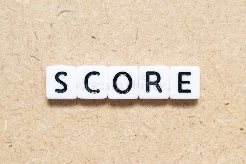 White Tile Letter with Word Score on Wood Background Stock Image ...