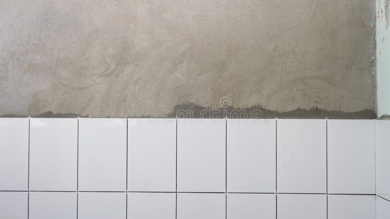White Tile on the Wall in the Bathroom, Wall Repair with Wall Tiles ...