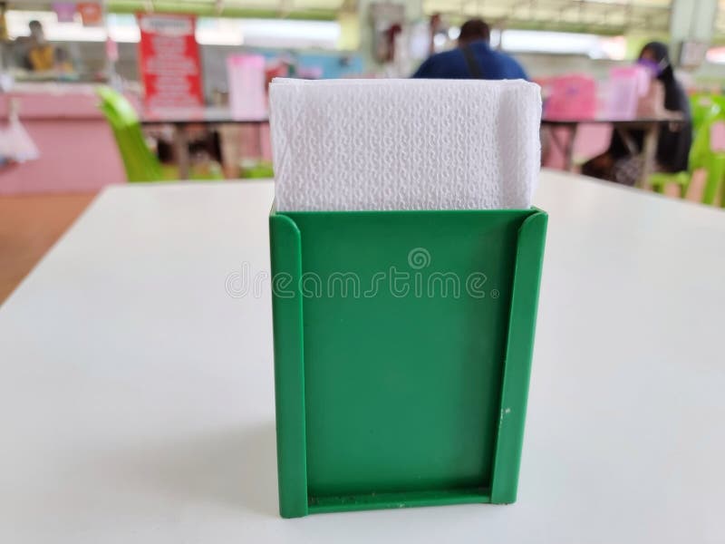 White Tissue Paper in Green Box on White Table Stock Photo - Image of ...