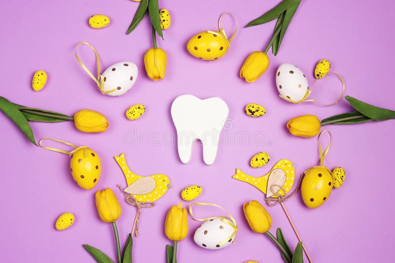 White Tooth with Easter Decorations on Purple Background. Dentist ...