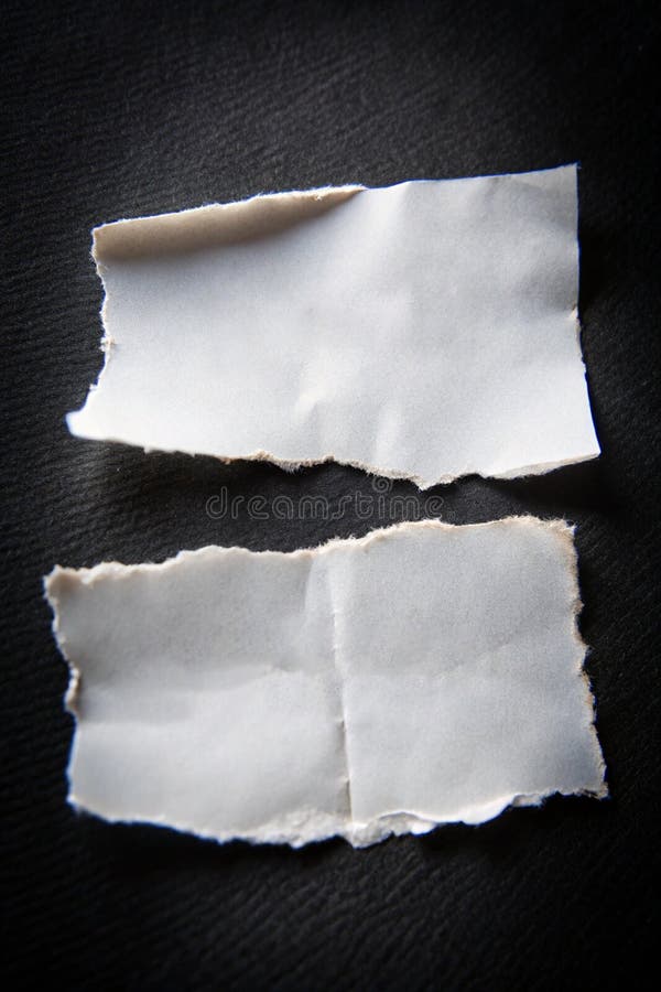 White Torn Paper Message Isolated on Black Background Stock ...