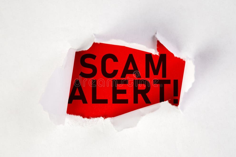 White Torn Paper with a Text of Scam Alert on Red Cardboard Stock Image ...