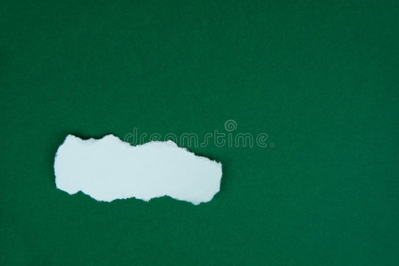 White Torn Up Paper Strip on a Green Stock Photo - Image of label ...