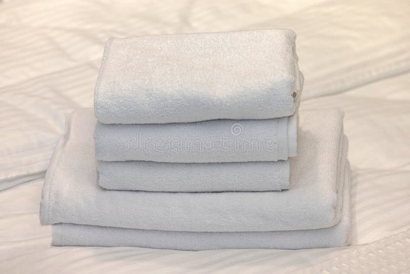 White Towels Stack Bed stock image. Image of towels - 264632001