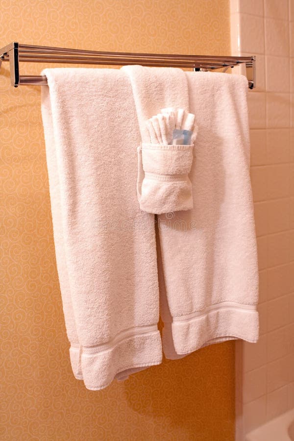 White Towels on Towel Rack in Hotel Stock Photo - Image of walls ...