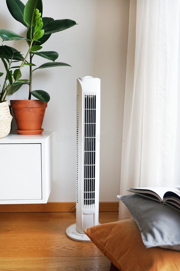 White Tower Fan in a Modern Interior Stock Photo - Image of bottle ...