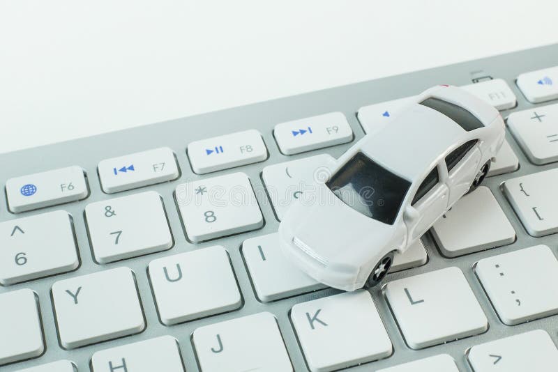 The White Toy Car on Keyboard Computer Close Up Image Background Stock ...