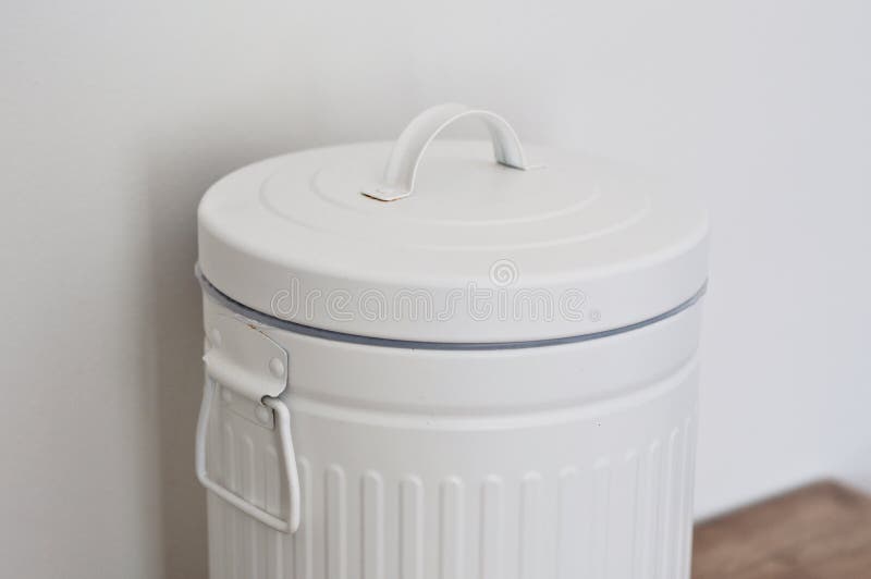 White Trash Can with Copy Space on White Wall. Trash Bin Stock Image ...