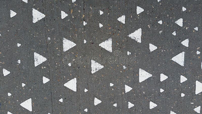 White Triangles Painted on Concrete Stock Photo - Image of template ...