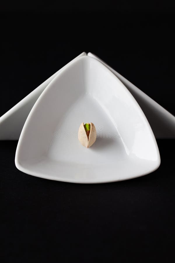 White Triangular Ceramic Bowls with Pistachio Nut. Stock Image - Image ...