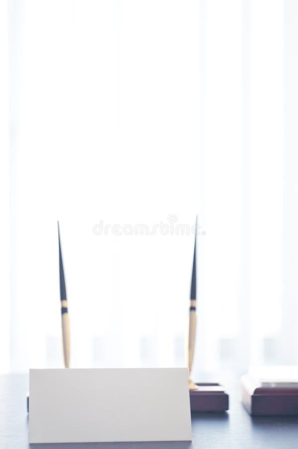 White Triangular Sign for the Label Standing on a Stock Photo - Image ...