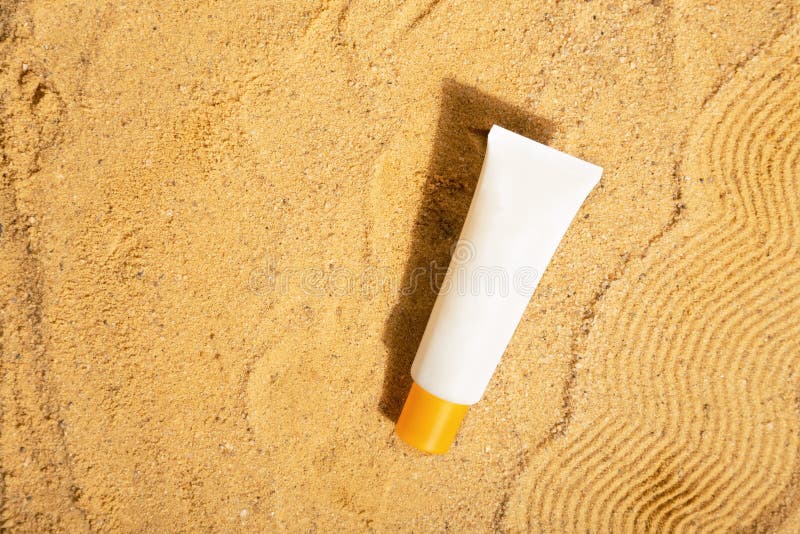 White Tube of Sunscreen on Beach Sand. Sun Protection. Top View Stock ...