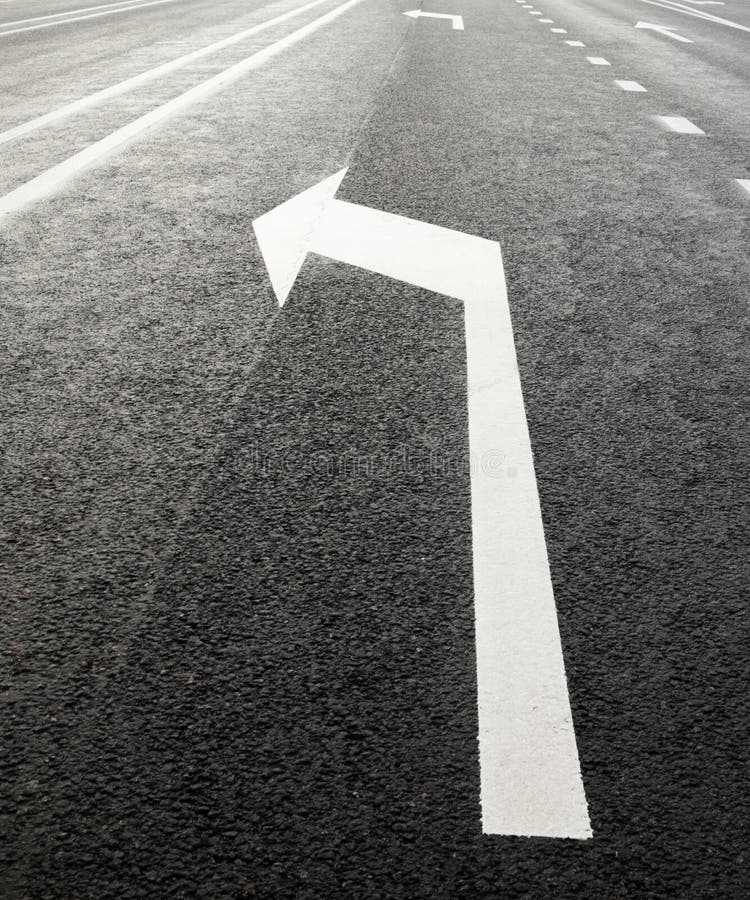 White Turn Left Arrow on the Road Stock Photo - Image of background ...