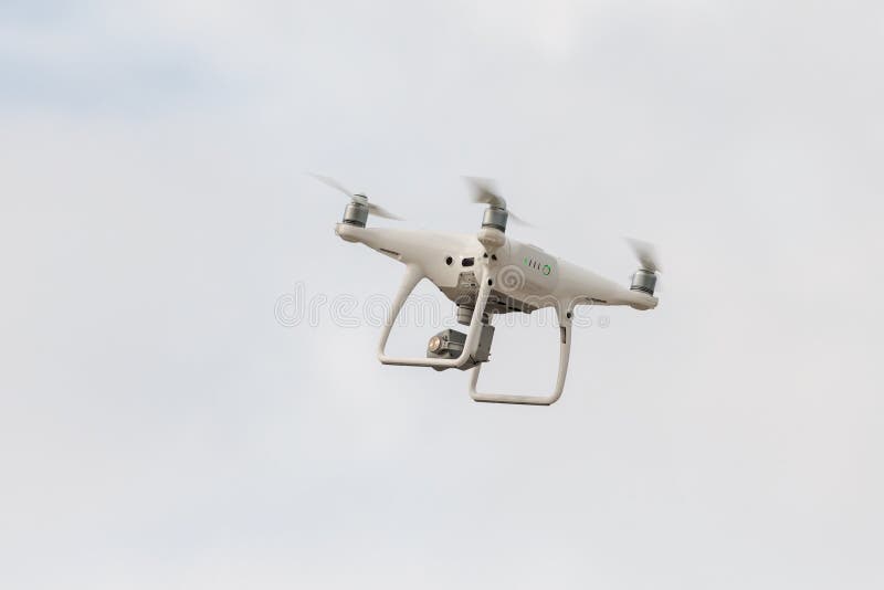 White Uav Drone Flying with Digital Camera and Filming Environment in ...