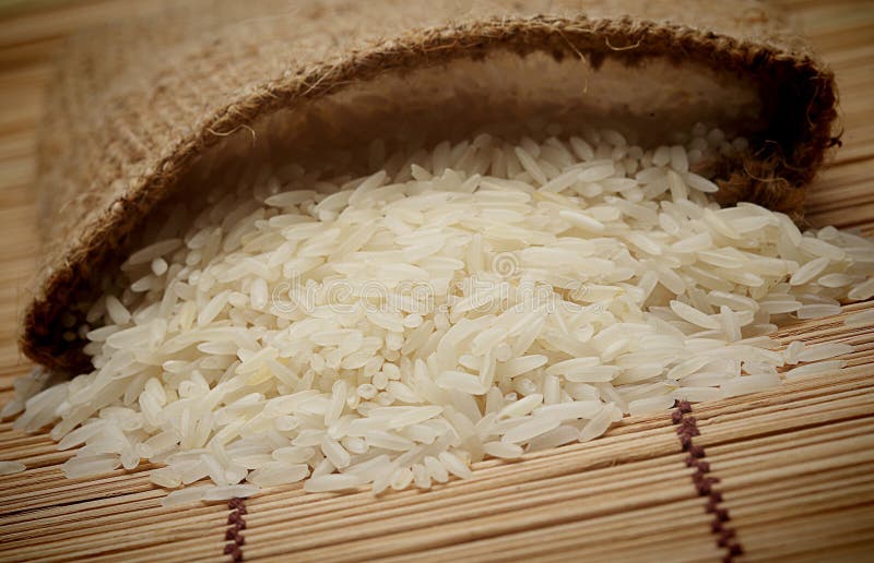 White Uncooked Rice in Small Sack Stock Photo - Image of natural ...