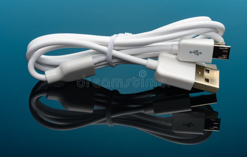 A White Usb Cable for Mobile on Glass with Reflection Stock Image ...