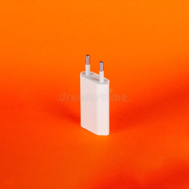 White USB Euro Plug Wall Charger Adapter for Mobile Phone on Orange ...