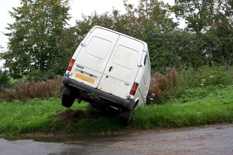A White Van Crashed into a Ditch Editorial Stock Photo - Image of road ...