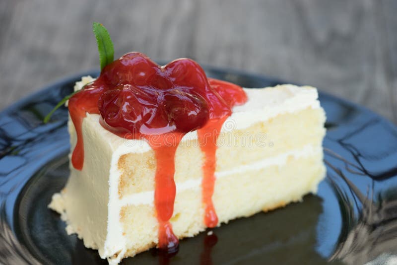 White Vanilla Cake with Raspberry Jam Topping Stock Photo - Image of ...