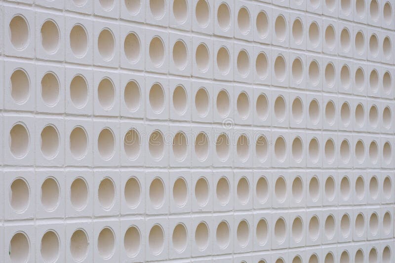 White Ventilation Block Wall Background with Circle Pattern in Modern ...