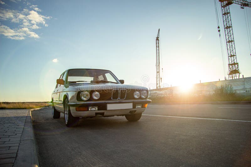White Vintage Classic Car with Round Headlights on the Road during ...