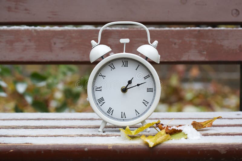 Vintage clock on a bench stock photo. Image of perspective - 102644164