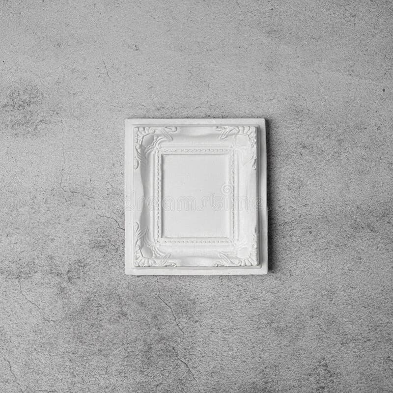 White Vintage Plaster Frame on a Concrete Gray Wall. Minimal Creative ...