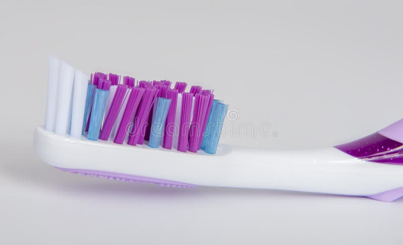 White and Violet Toothbrush for Healthcare Teeth on the White Stock ...