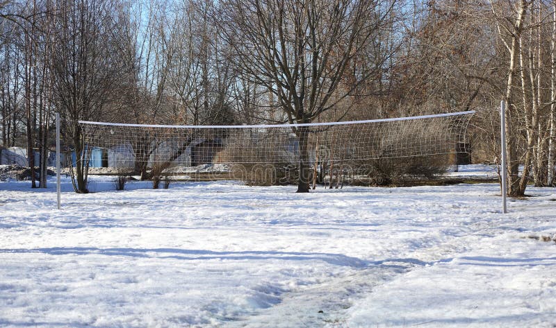 White Volleyball Net is Stretched Over a Snow-covered Volleyball Stock ...