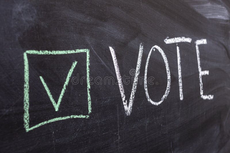 White Vote Lettering Near Check Mark on Black Chalkboard Stock Image ...
