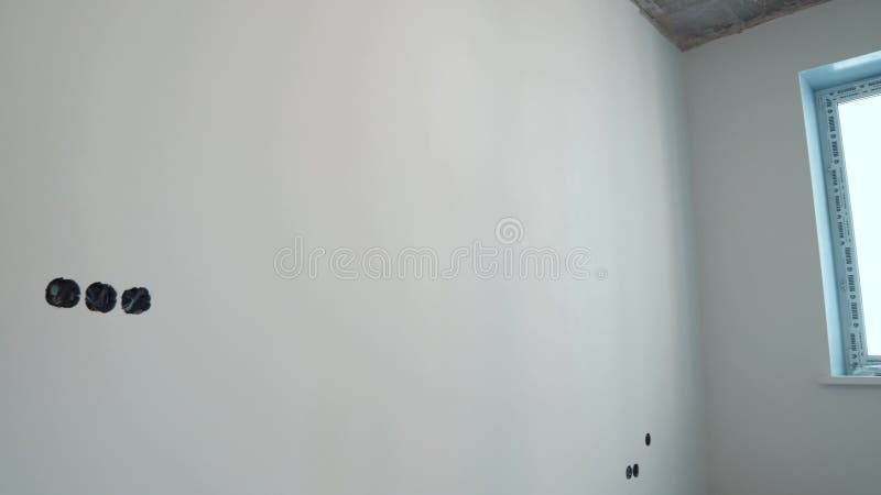 White Wall with Circular Electrical Outlets Junction Boxes in the Wall ...