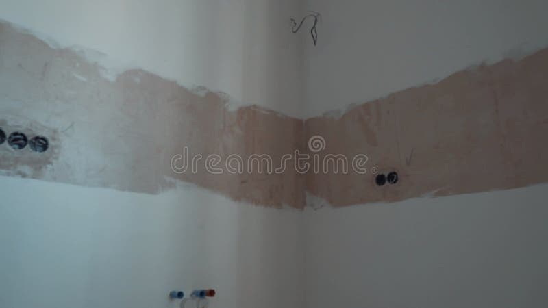 White Wall with Circular Electrical Outlets Junction Boxes in the Wall ...