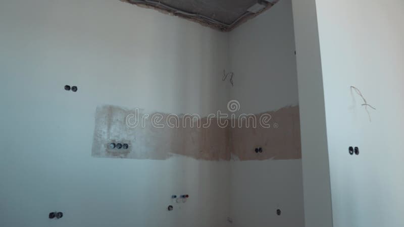 White Wall with Circular Electrical Outlets Junction Boxes in the Wall ...