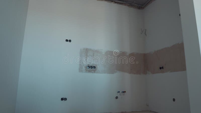 White Wall with Circular Electrical Outlets Junction Boxes in the Wall ...